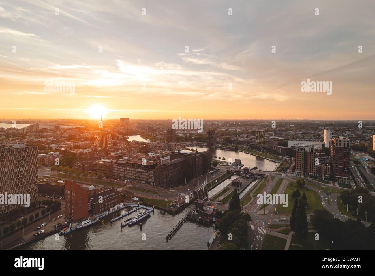Sunset over Rotterdam city centre and its surrounding park. Sunset in ...