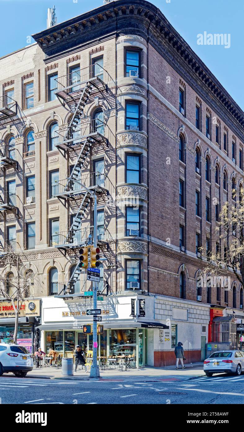 Ornate terra cotta spandrels punctuate the turreted corner of 252 East ...