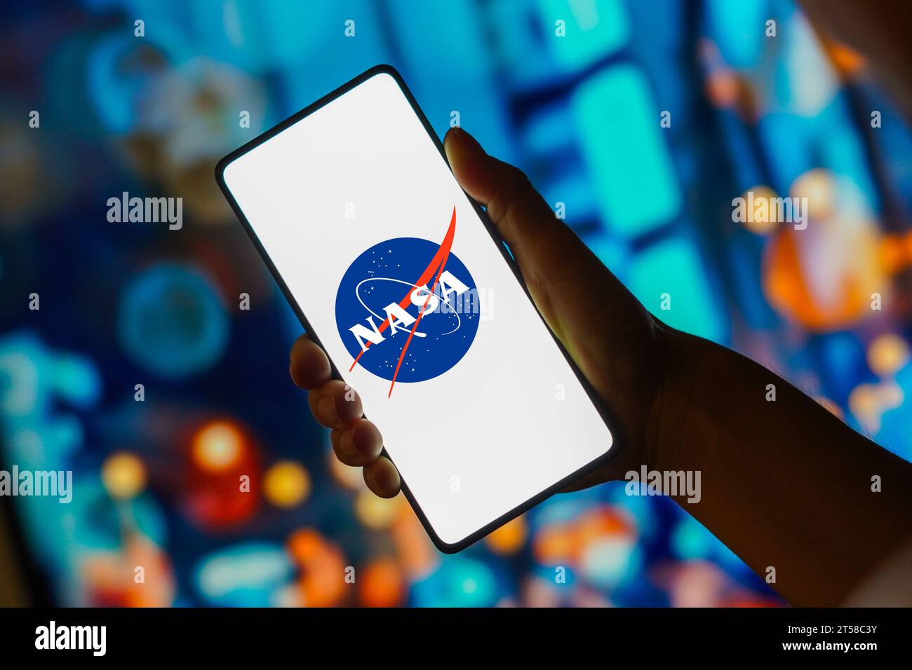 In this photo illustration, the NASA (National Aeronautics and Space ...