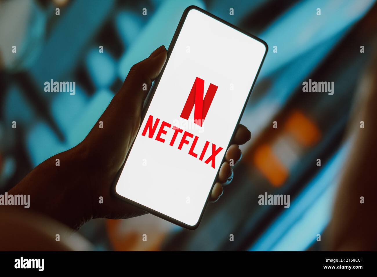 In this photo illustration, the Netflix logo is displayed on a ...