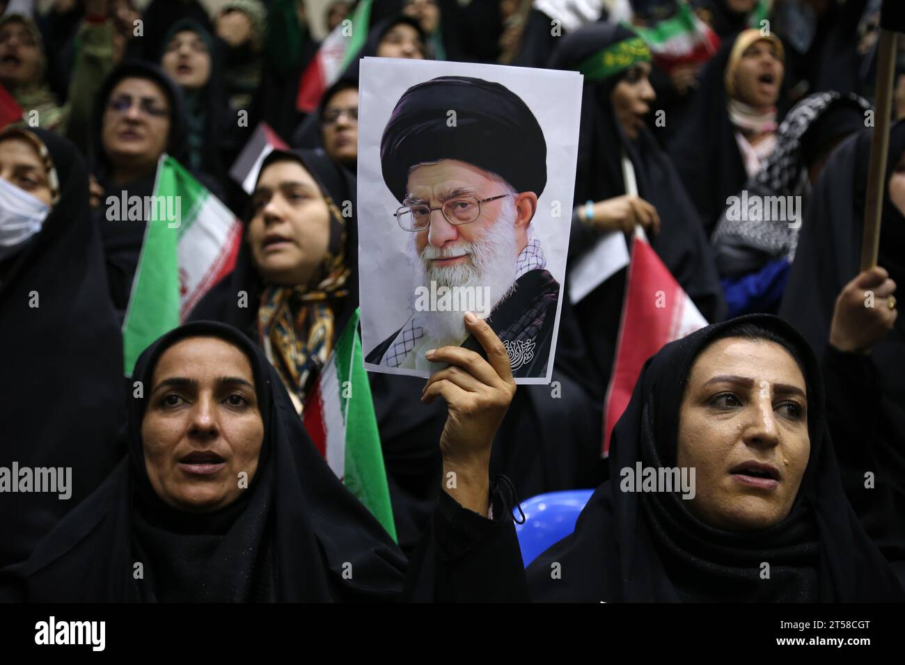 Tehran, Iran. 2nd Nov, 2023. An Iranian veiled woman holds a portrait ...