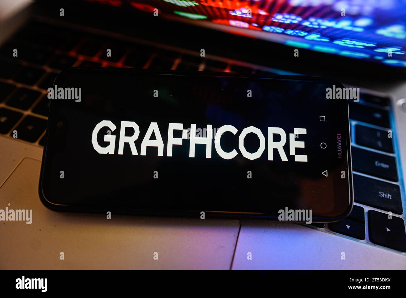 In this photo illustration a Graphcore logo is displayed on a ...