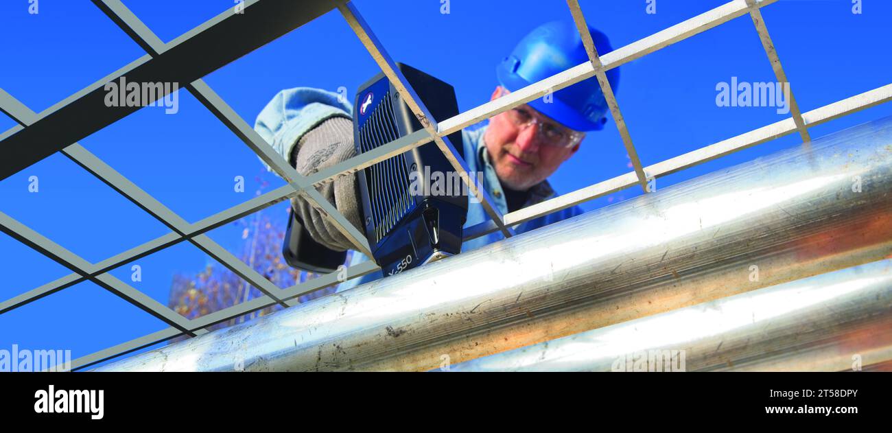 Man testing oil and gas refinery Stock Photo - Alamy