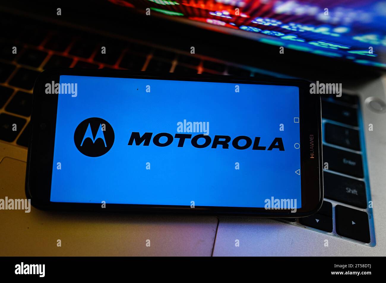 In this photo illustration a Motorola logo is displayed on a smartphone ...