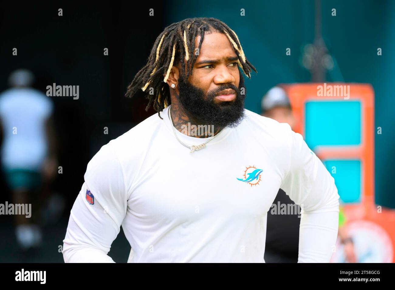 Miami Dolphins running back Raheem Mostert (31) walks onto the field ...
