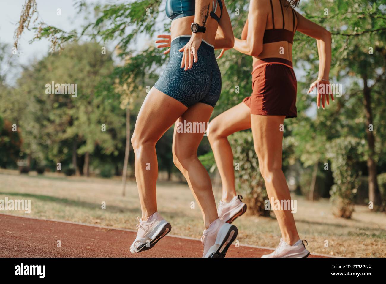 Fit Girls Jogging in Nature for Outdoor Fitness and Workout Motivation ...