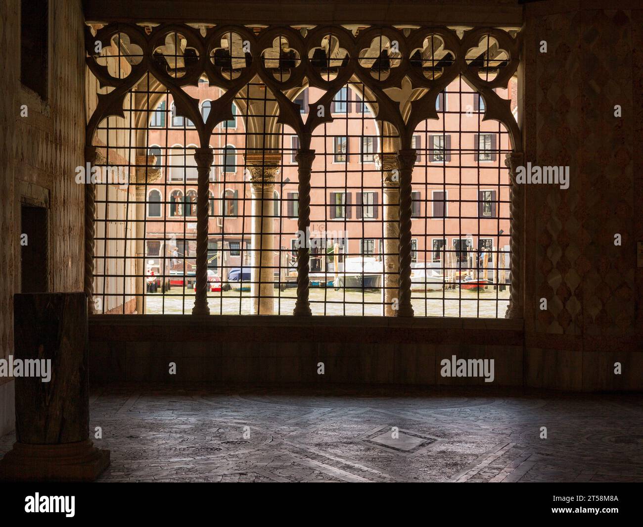The grand canal seen from inside the base of the Villa Ca d'Oro through ...