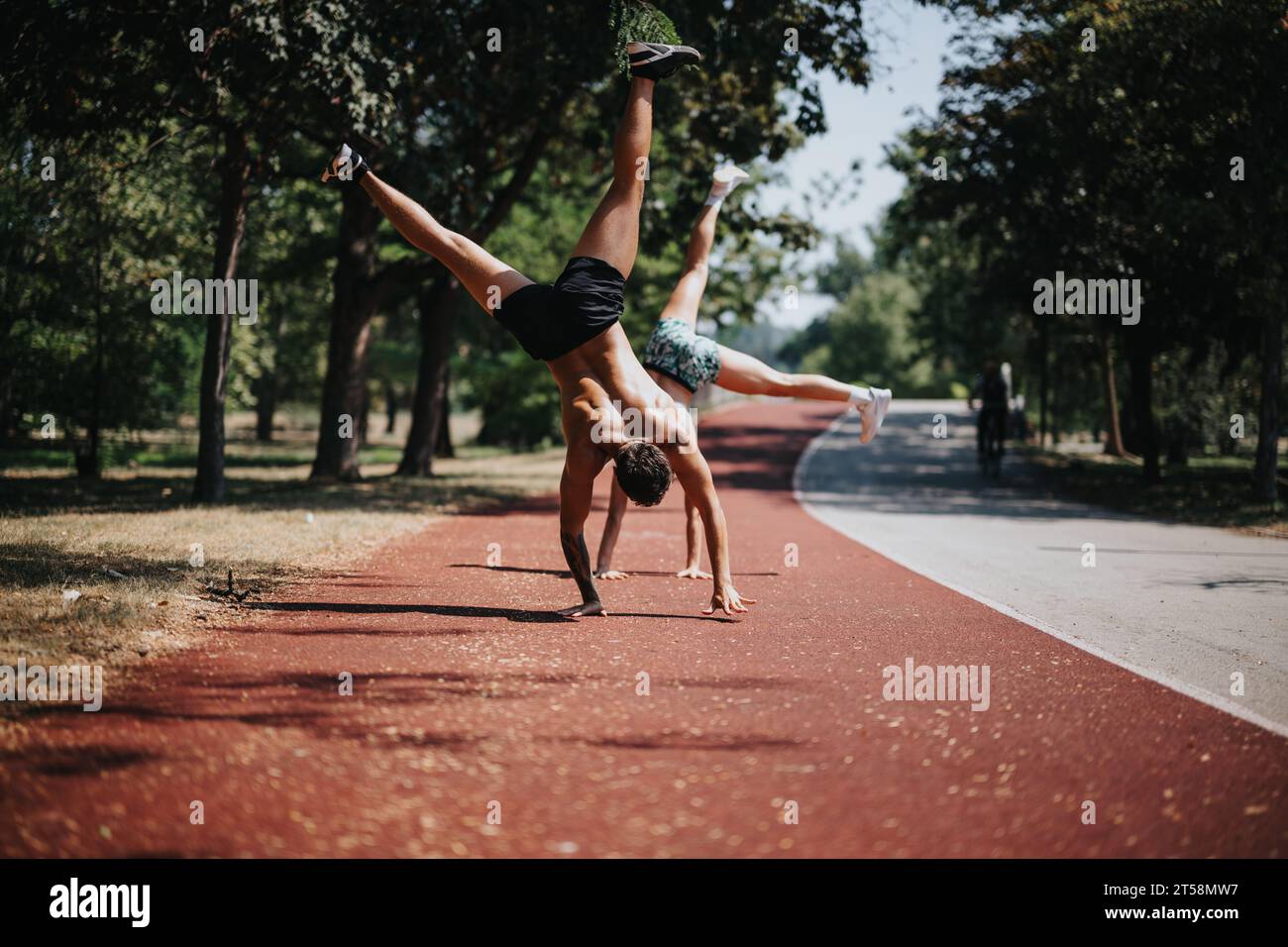 Sportspeople doing cartwheel hi-res stock photography and images - Alamy