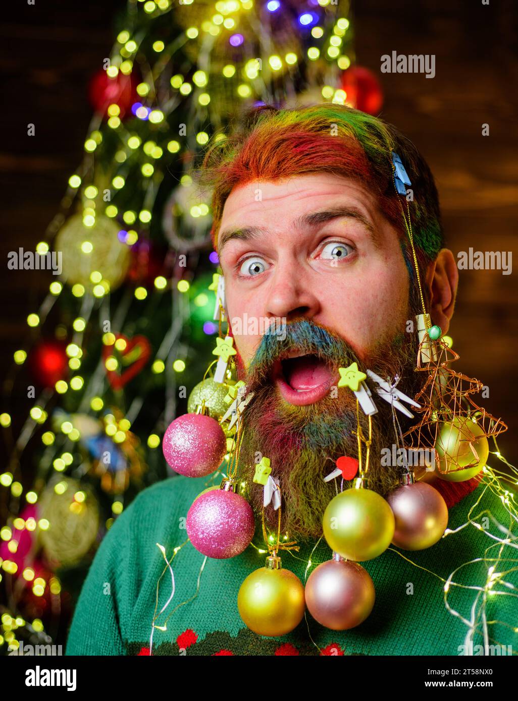 Merry Christmas and Happy New Year. Surprised bearded man with dyed ...