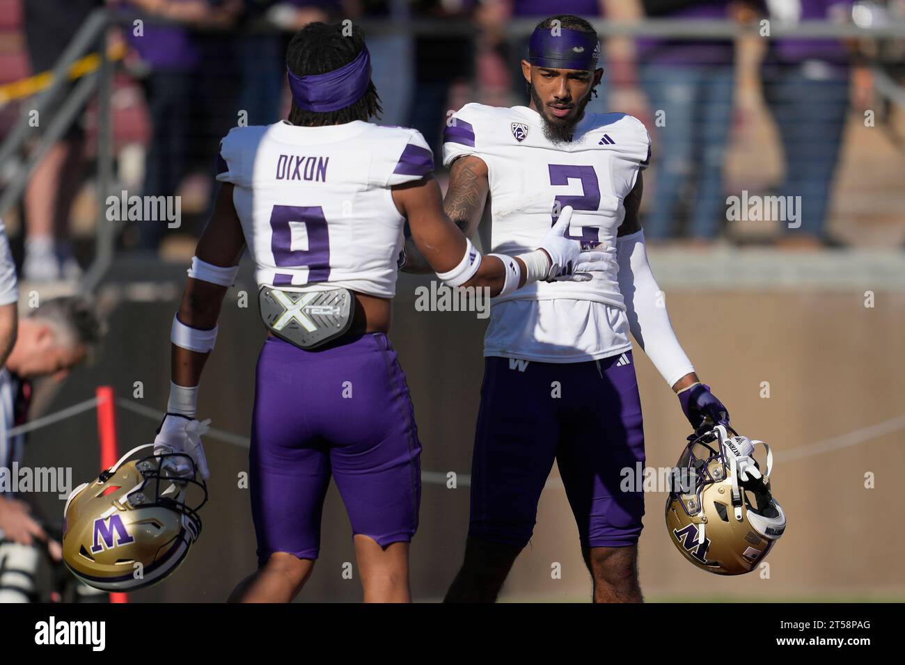 Washington cornerback Thaddeus Dixon (9) and wide receiver Ja'Lynn Polk ...