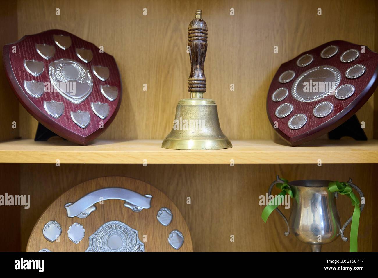 Trophies For Achievement On Display In Cabinet With Old Fashioned ...