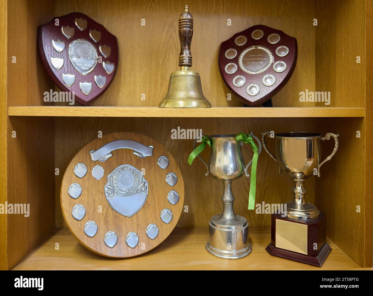 Trophies For Achievement On Display In Cabinet With Old Fashioned ...