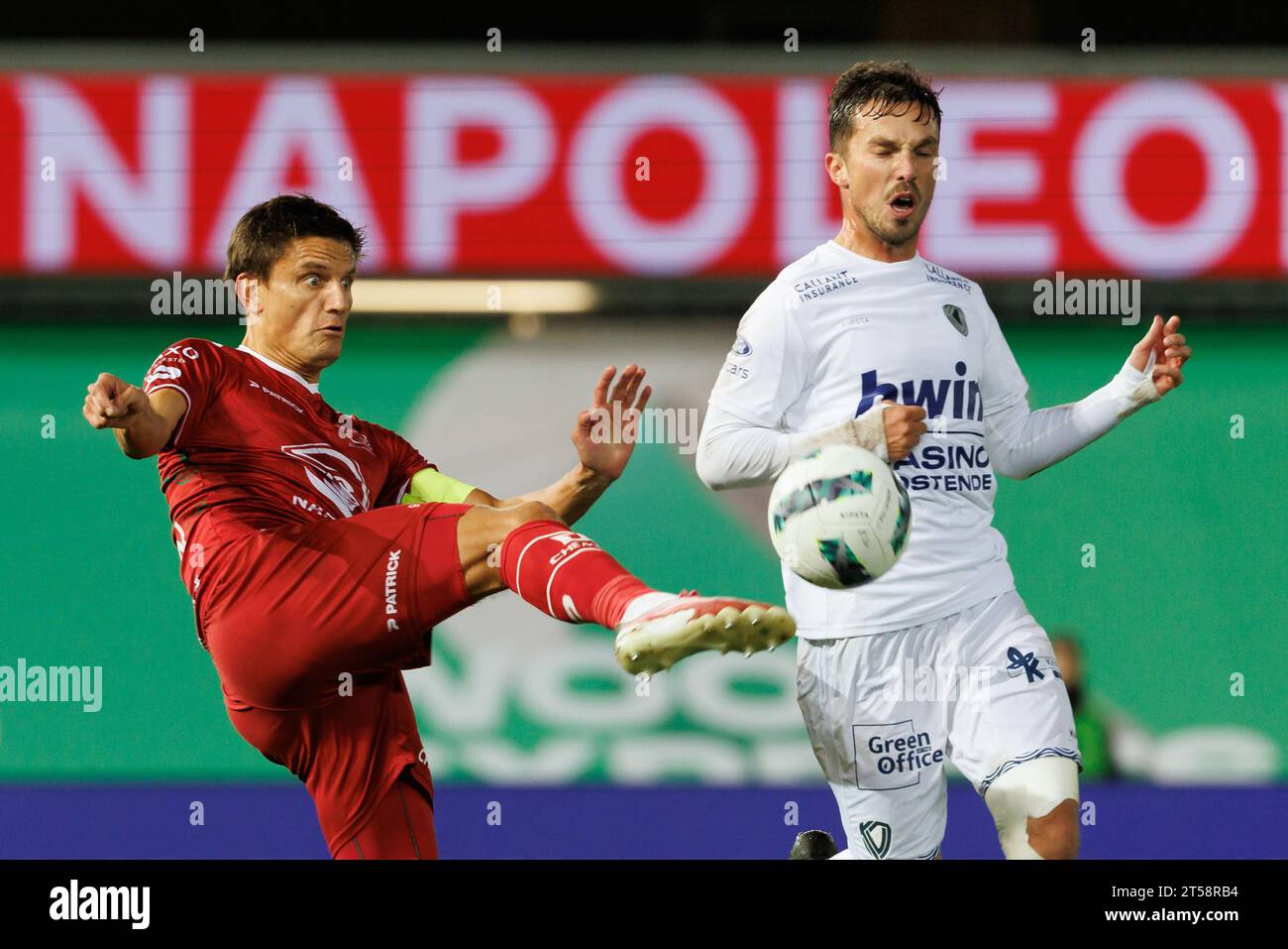 Waregem, Belgium. 03rd Nov, 2023. Essevee's Jelle Vossen and Oostende's ...