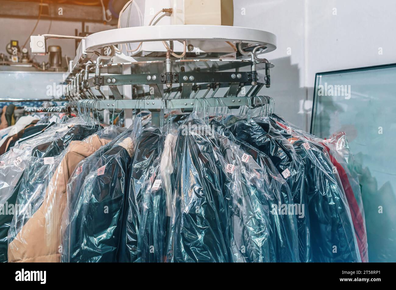 Dry cleaner clothes rail hi-res stock photography and images - Alamy