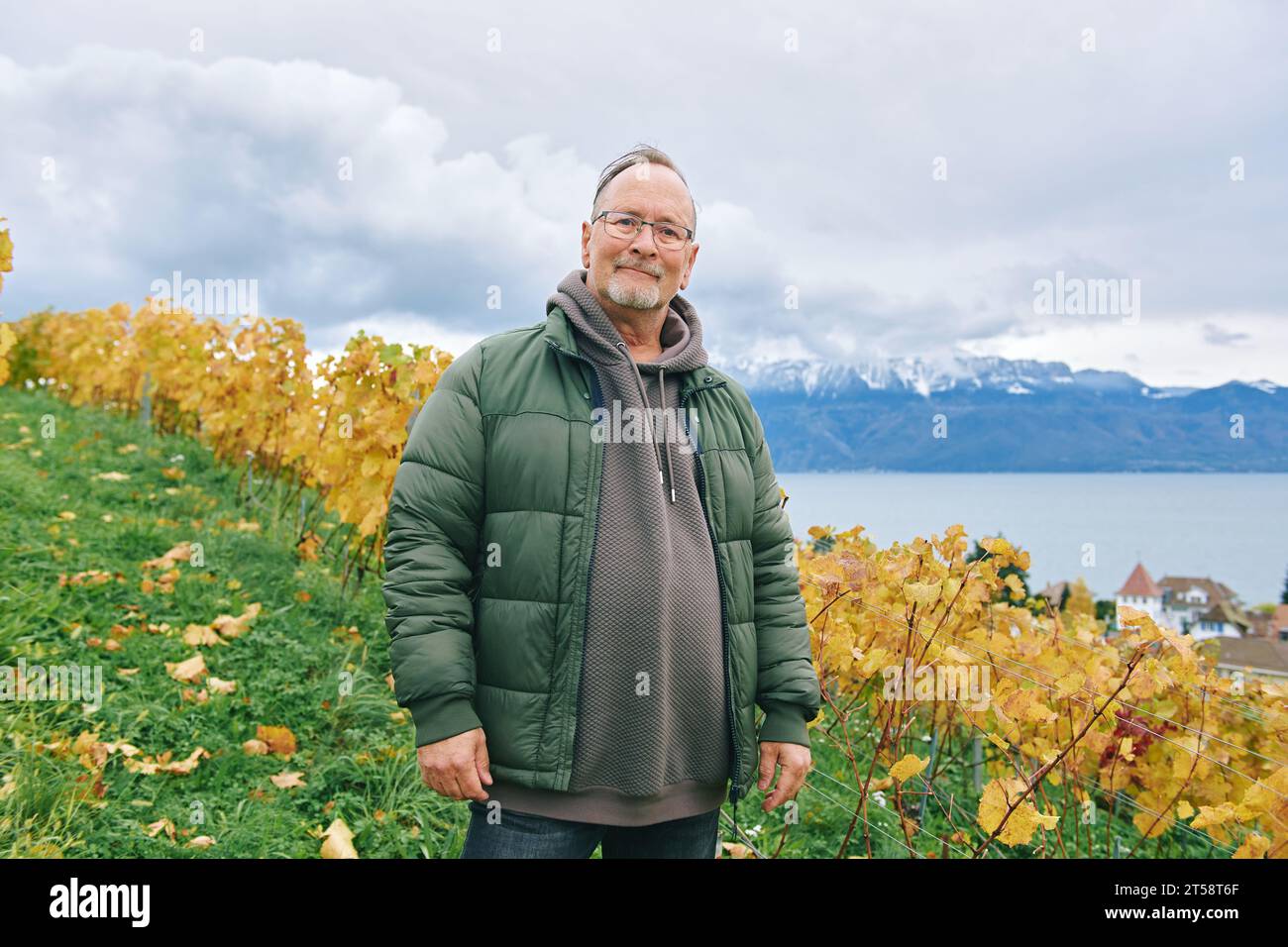 Outdoor portrait of middle age 55 - 60 year old man enjoing nice autumn ...