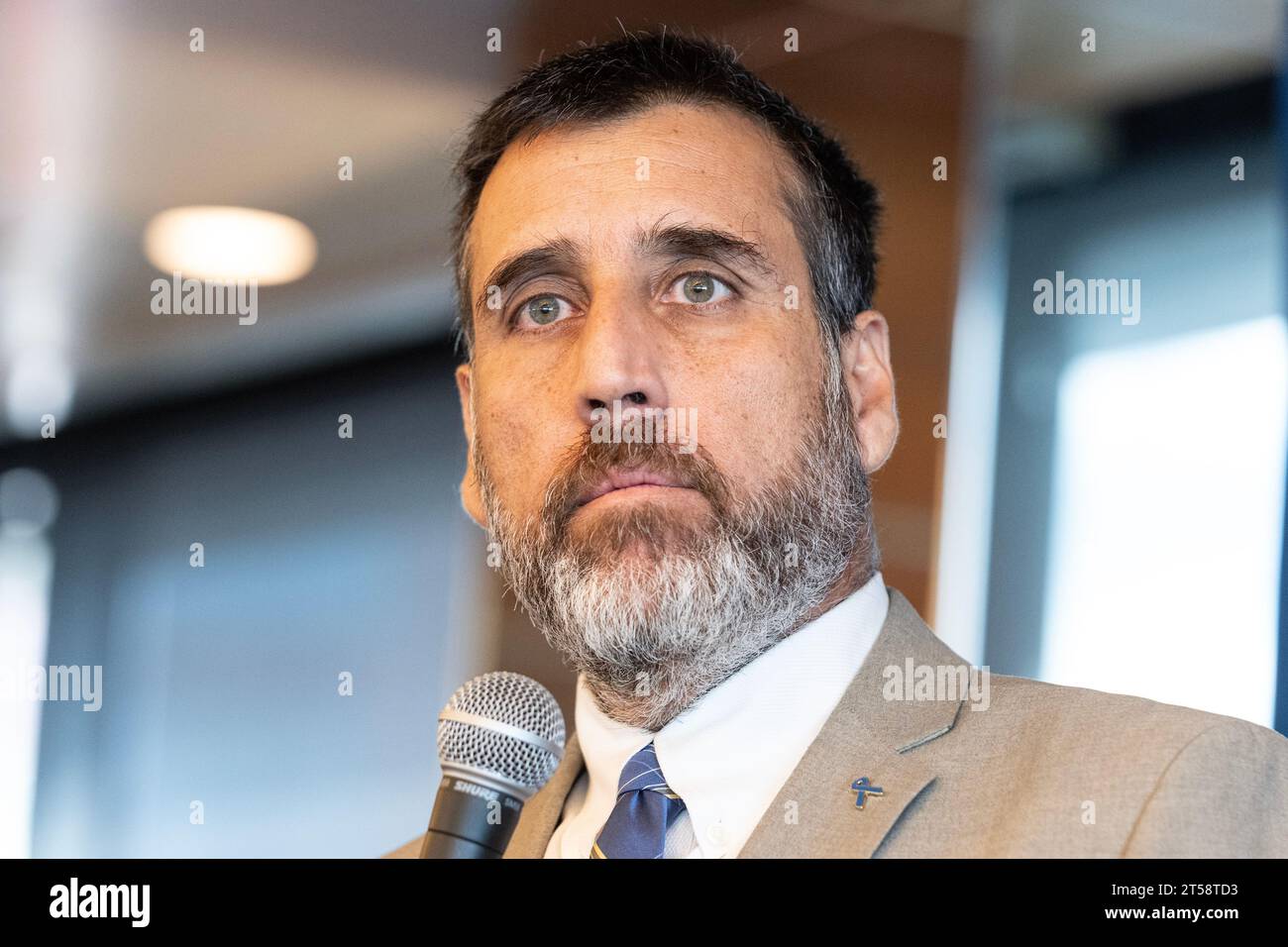 Deputy head of Mashav speaks during rally of 240 Holocaust survivors ...