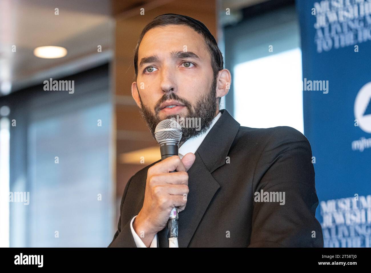Assemblymember Simcha Eichenstein speaks during rally of 240 Holocaust ...