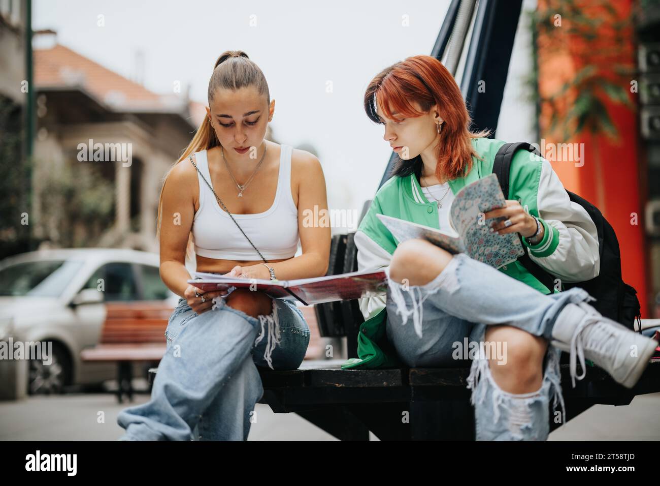 Teenagers Enjoying Outdoor Study Session with Friends Stock Photo - Alamy