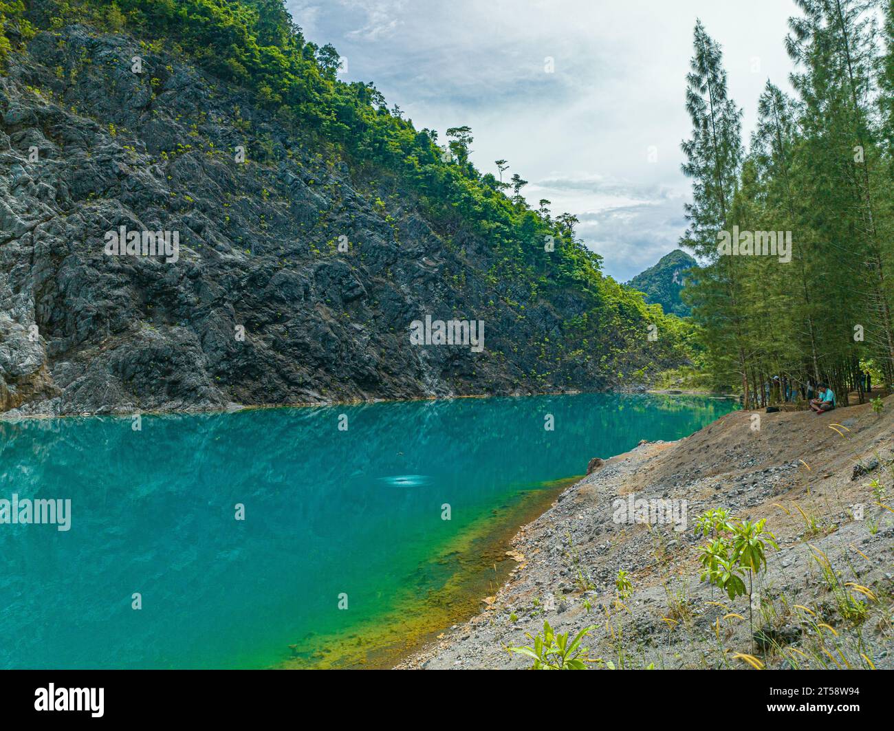 Aerial view beautiful The reflection of the blue sky in the emerald green pond. Emerald green ...