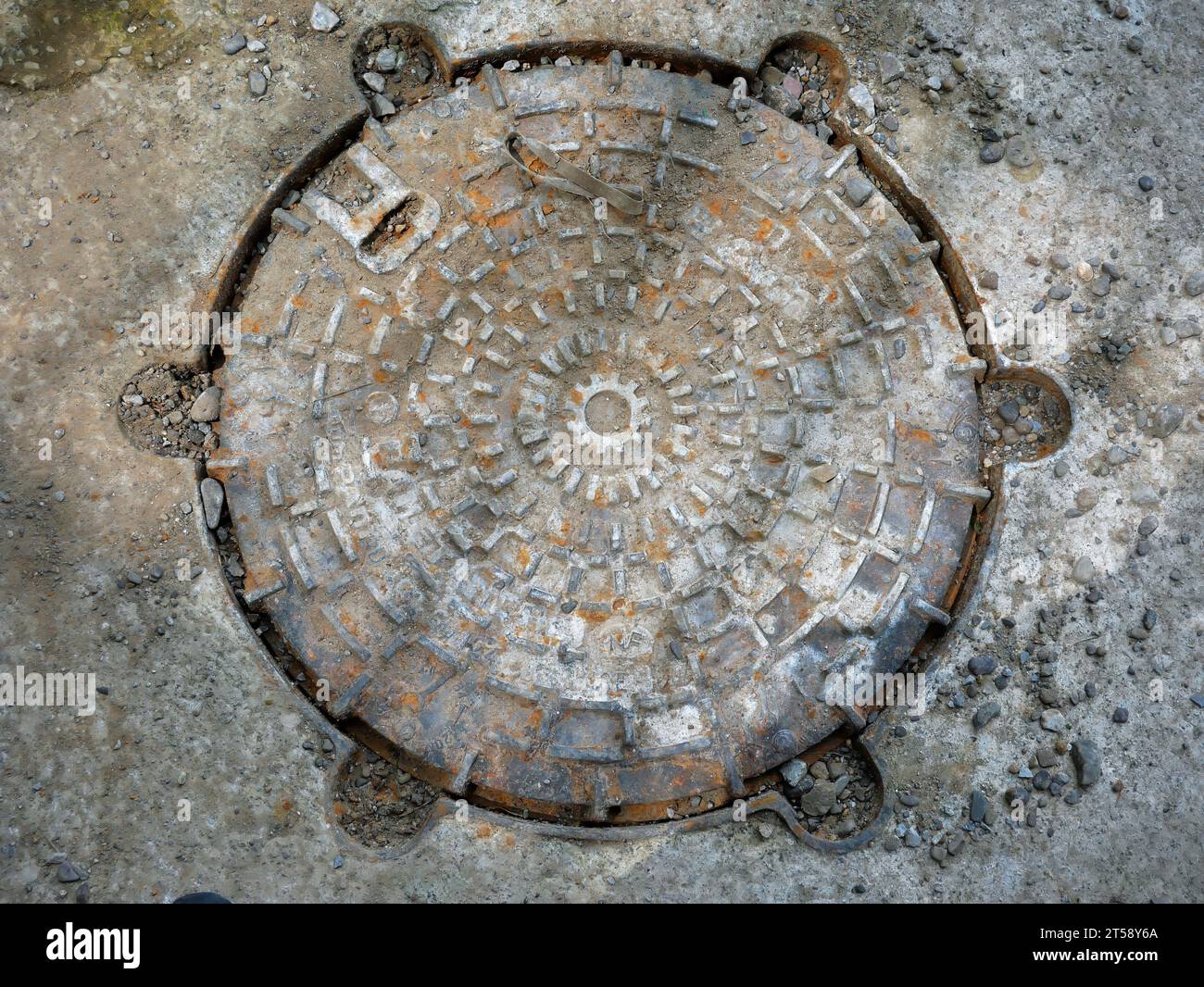 Manhole grunge style background, ground close view photo Stock Photo ...
