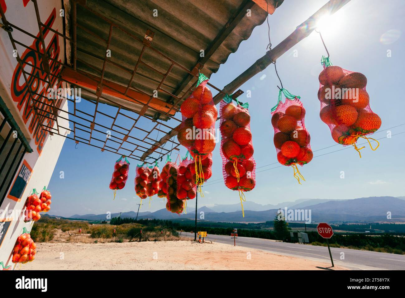 An Orange stall beside the road selling fruit and veg in the Western ...