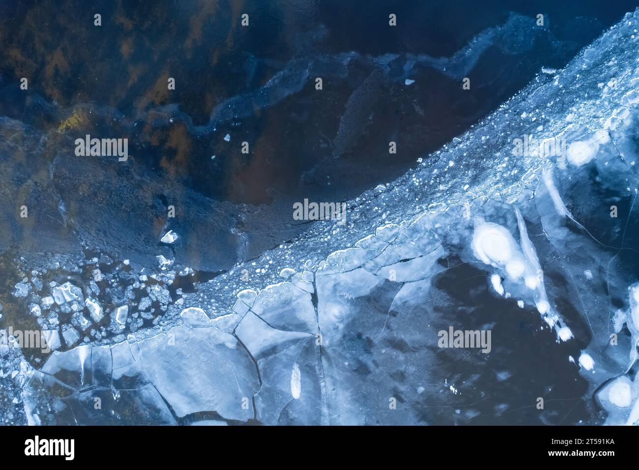 Aerial view of frozen lake. Ice from drone view. Background texture ...