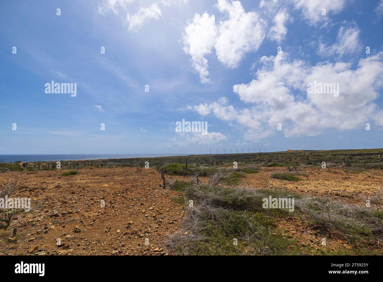 Stunning view of rocky desert set against backdrop of Caribbean sea and ...