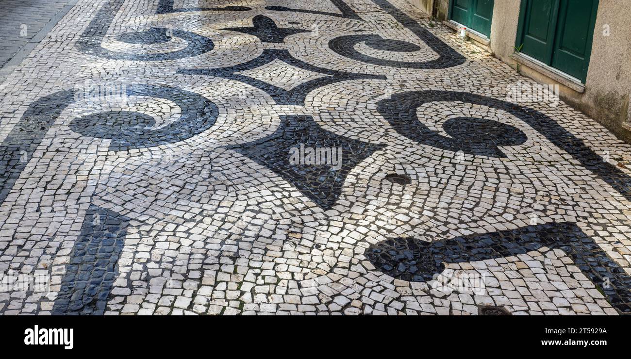 Classical black & white mosaic tiles on pavement in Santa Catarina ...