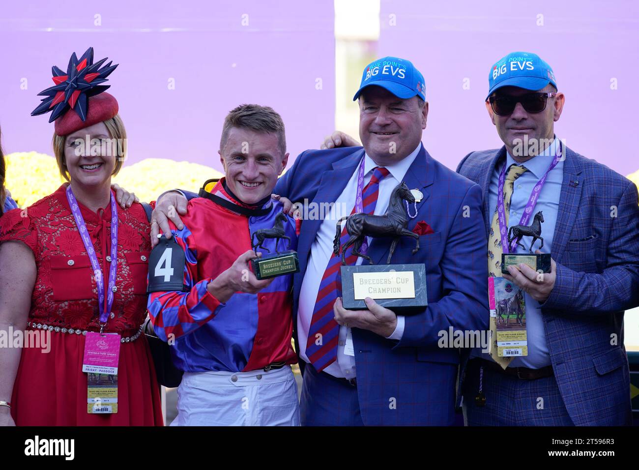 Jockey Tom Marquand, second from left, poses with owners Rachael ...
