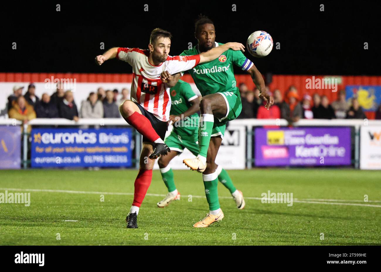 Sheppey United’s Alexander Willis battles for the ball against Walsall ...