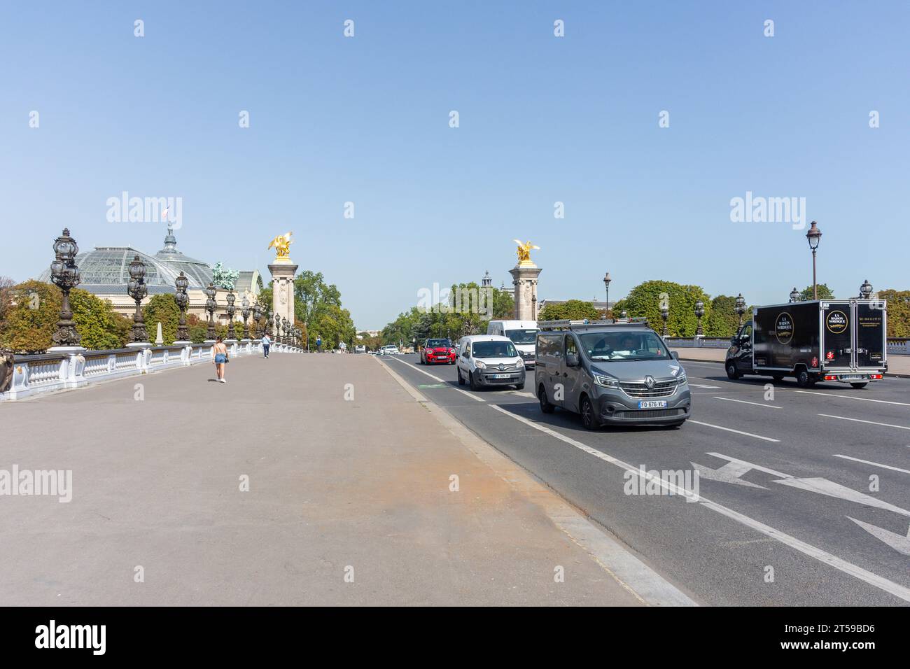 Road traffic over Pont Alexandre III bridge, 8th arrondissement, Paris ...