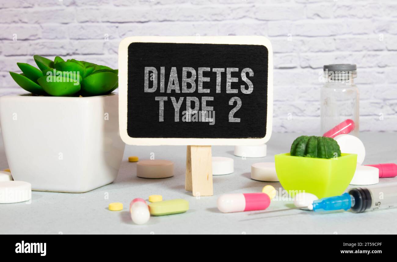 Ampoules, pills, stethoscope, thermometer, tablet with DIABETES TYPE 2 ...