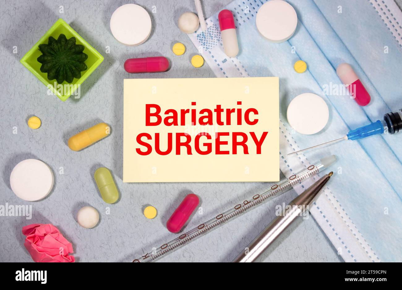 Grey stethoscope and paper plate with a sheet of white paper with text ...