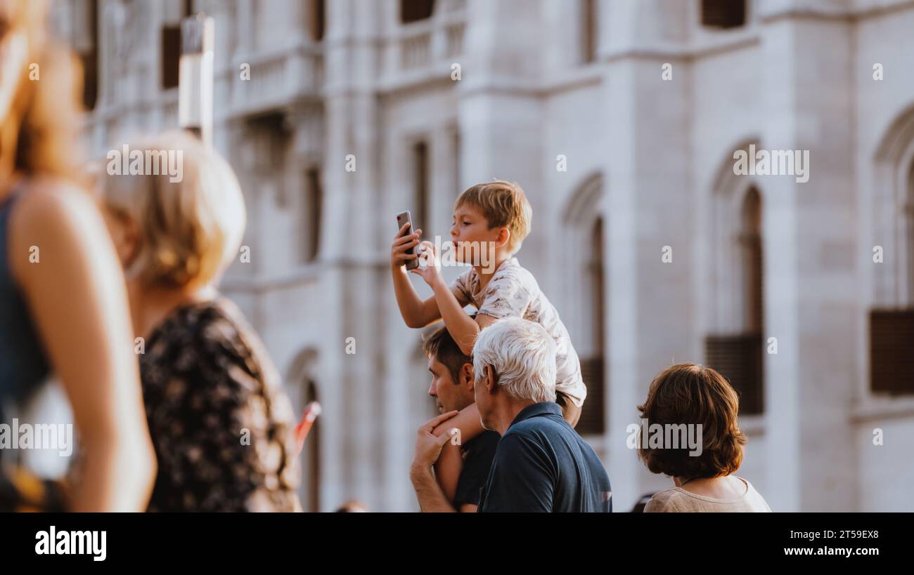 A large crowd of protesters with banners on the streets of Budapest ...