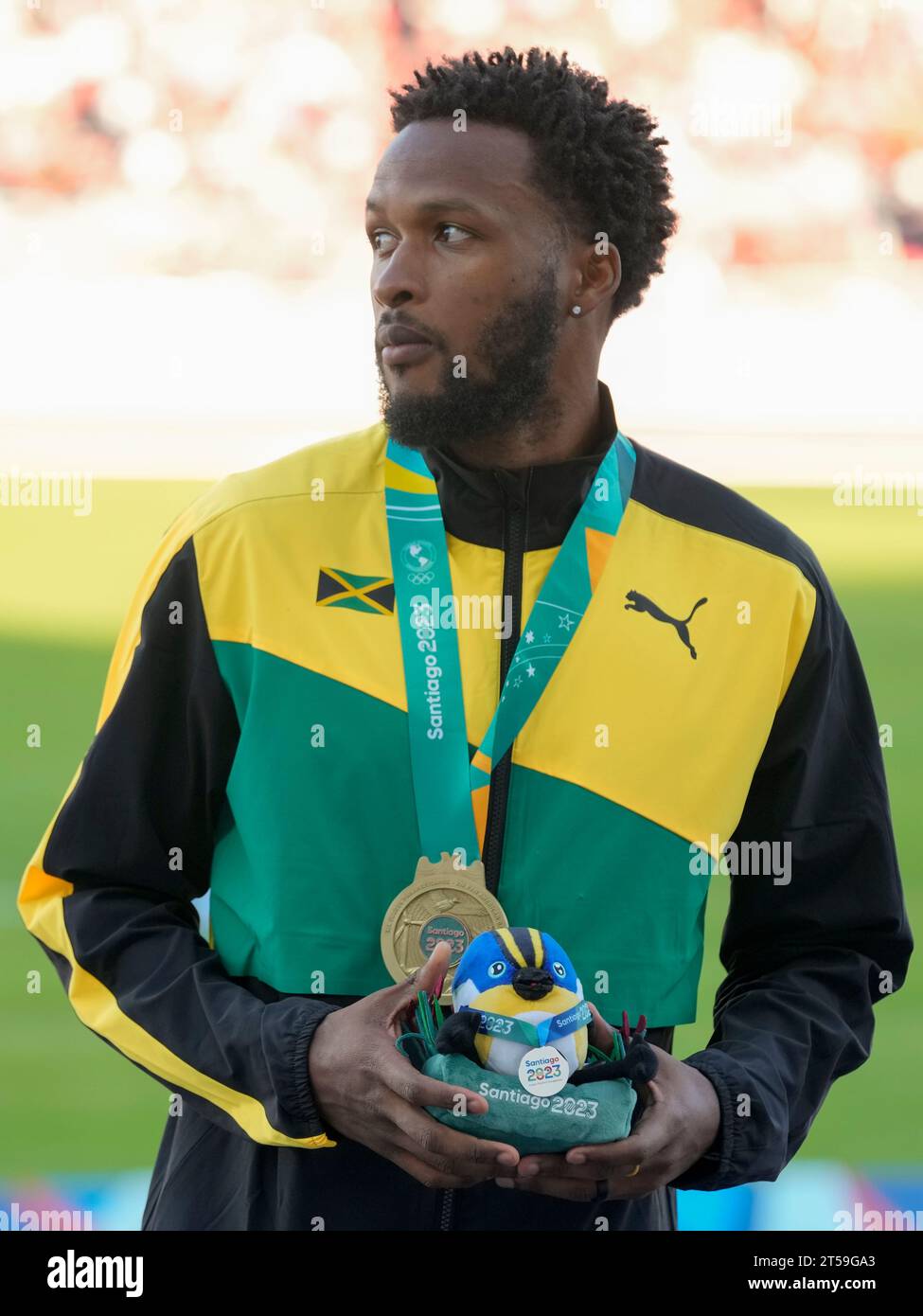 Jamaica's Jaheel Hyde pose with his gold medal on the podium during a ...