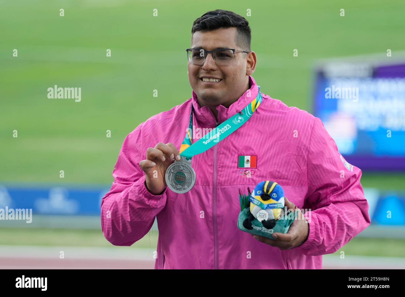 Mexico's Aaron Munoz poses with his silver medal on the podium during a ...