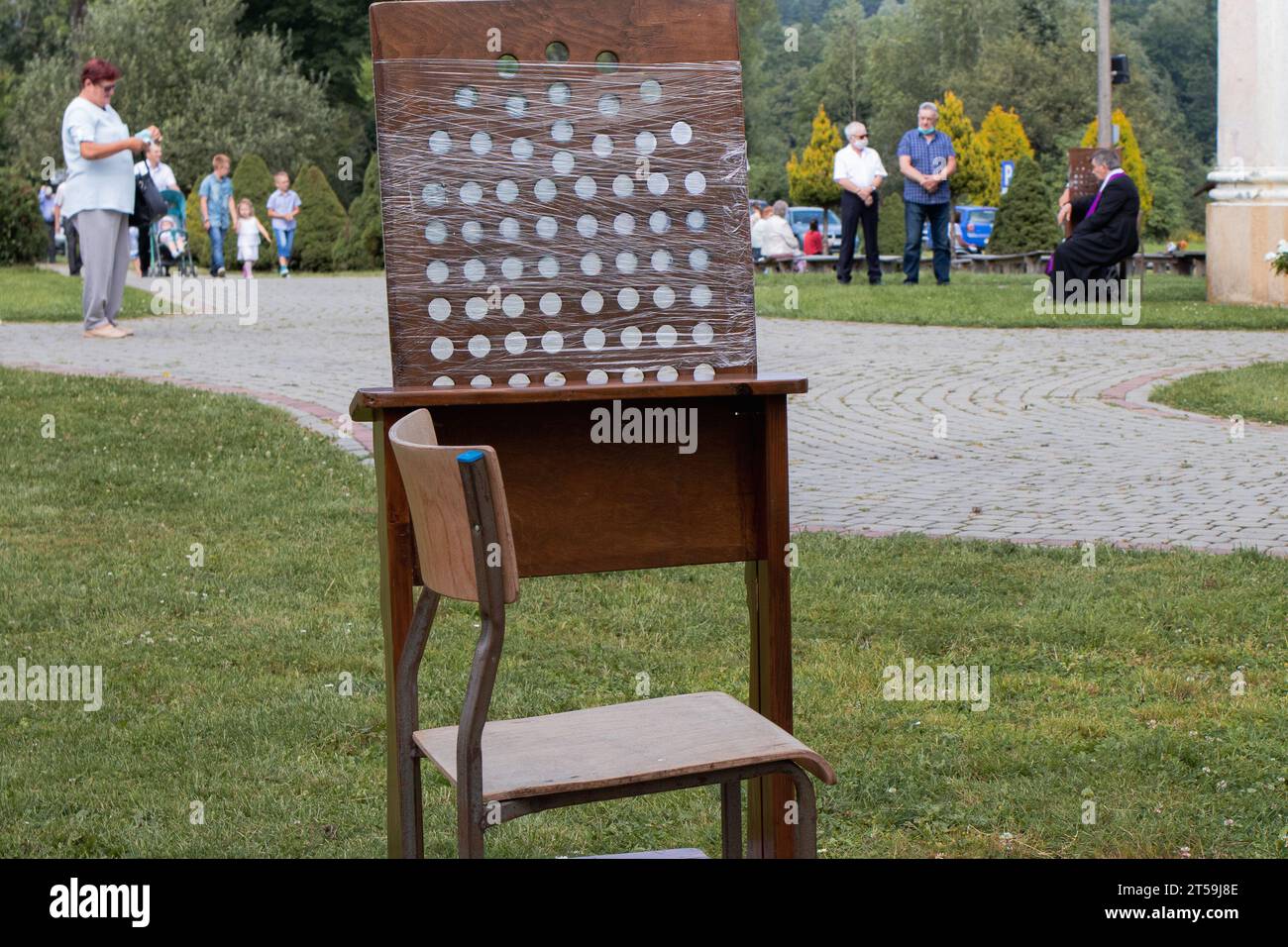 Confessional chair and kneeler. Corpus cristi mass celebrated amid ...