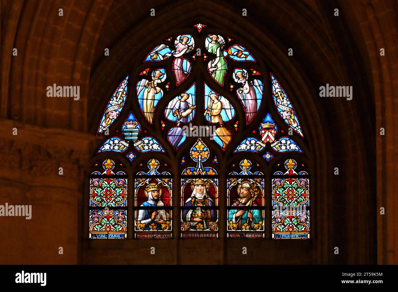 Arched stained glass window inside the Cathedral of St. Michael and St ...