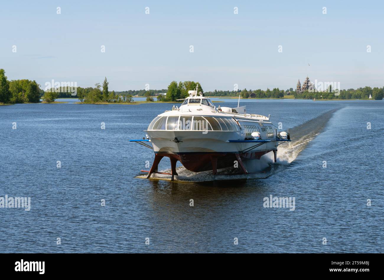 Tourist motor ship Meteor hydrofoils floating on Lake Onega against the ...