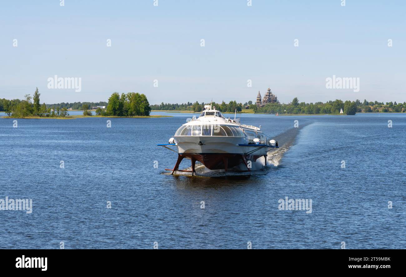 Tourist motor ship Meteor hydrofoils floating on Lake Onega against the ...
