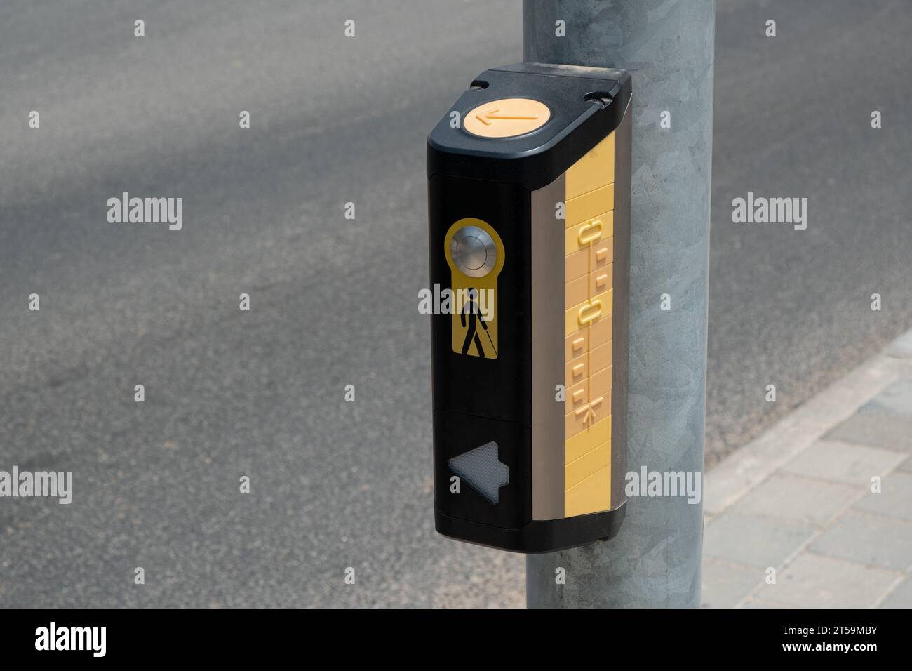 button, positioned at crosswalks. tactile button, mounted on a pole ...