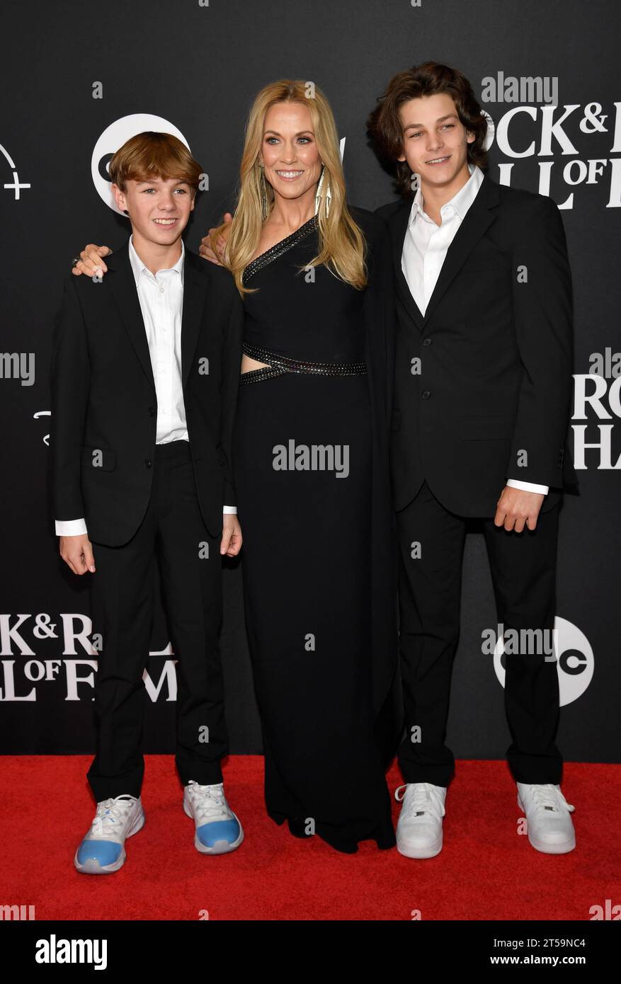 Levi Crow, from left, Sheryl Crow and Wyatt Crow arrive at the Rock ...