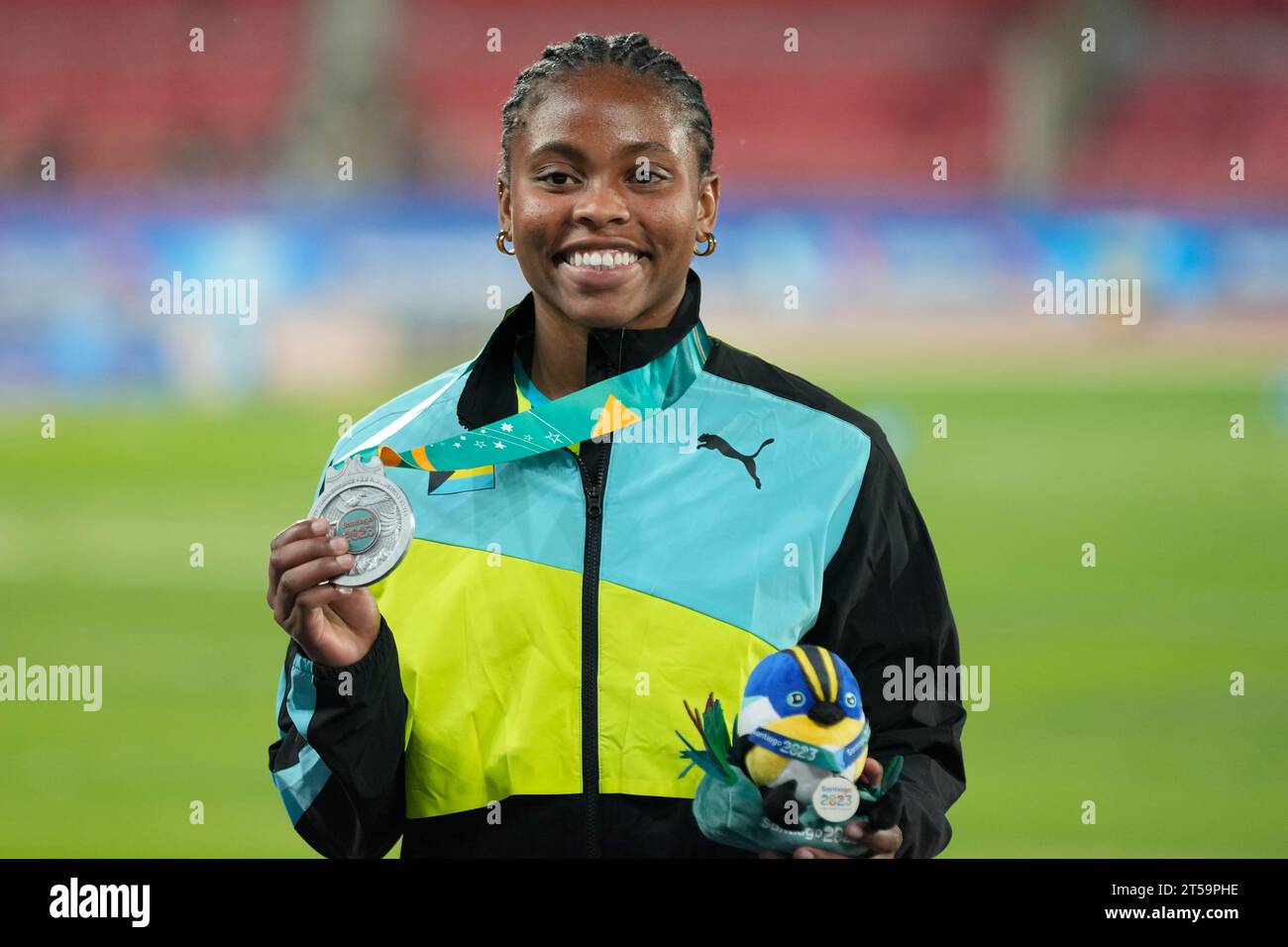 Bahamas' Rhema Otabor poses with her silver medal on the podium during ...