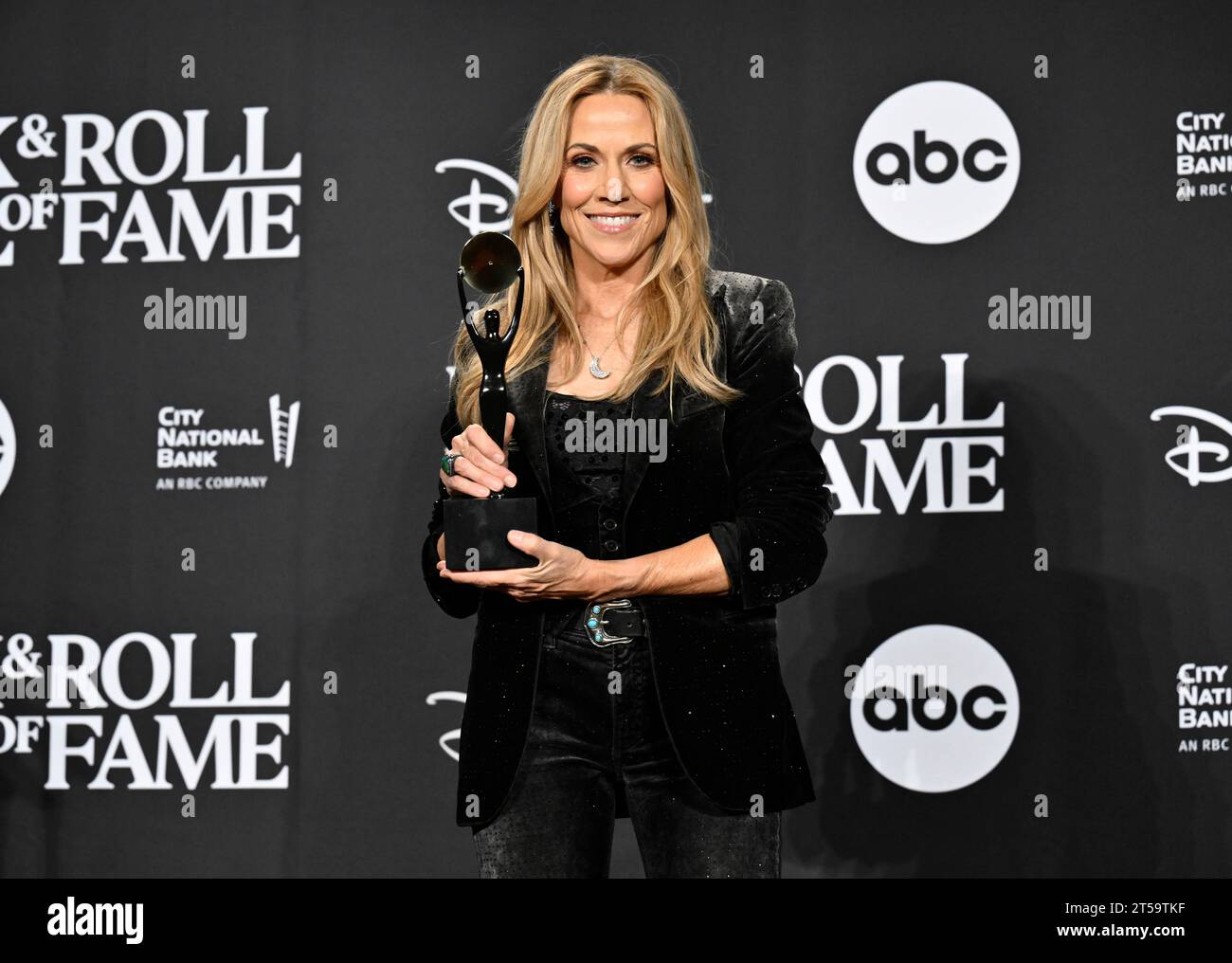 Sheryl Crow poses in the press room during the Rock & Roll Hall of Fame ...
