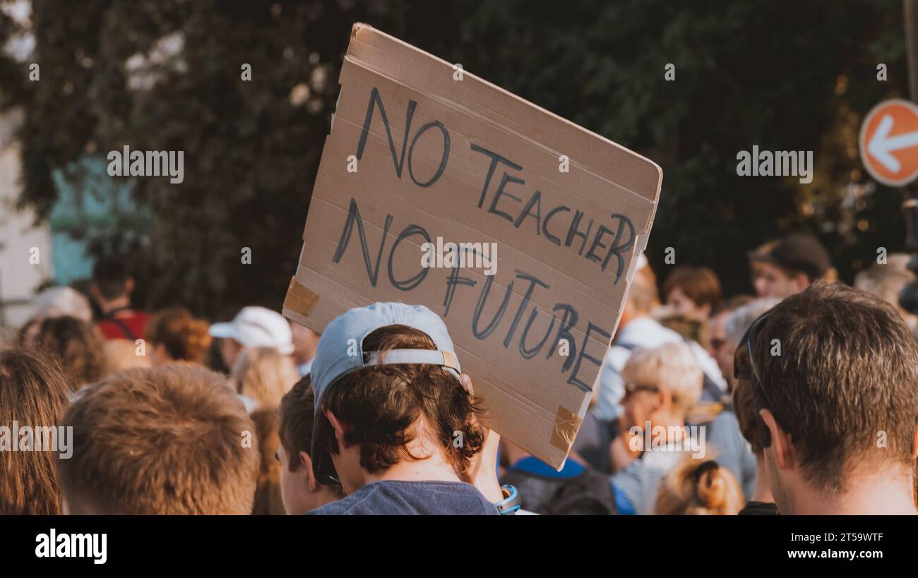 A large crowd of protesters with banners on the streets of Budapest ...
