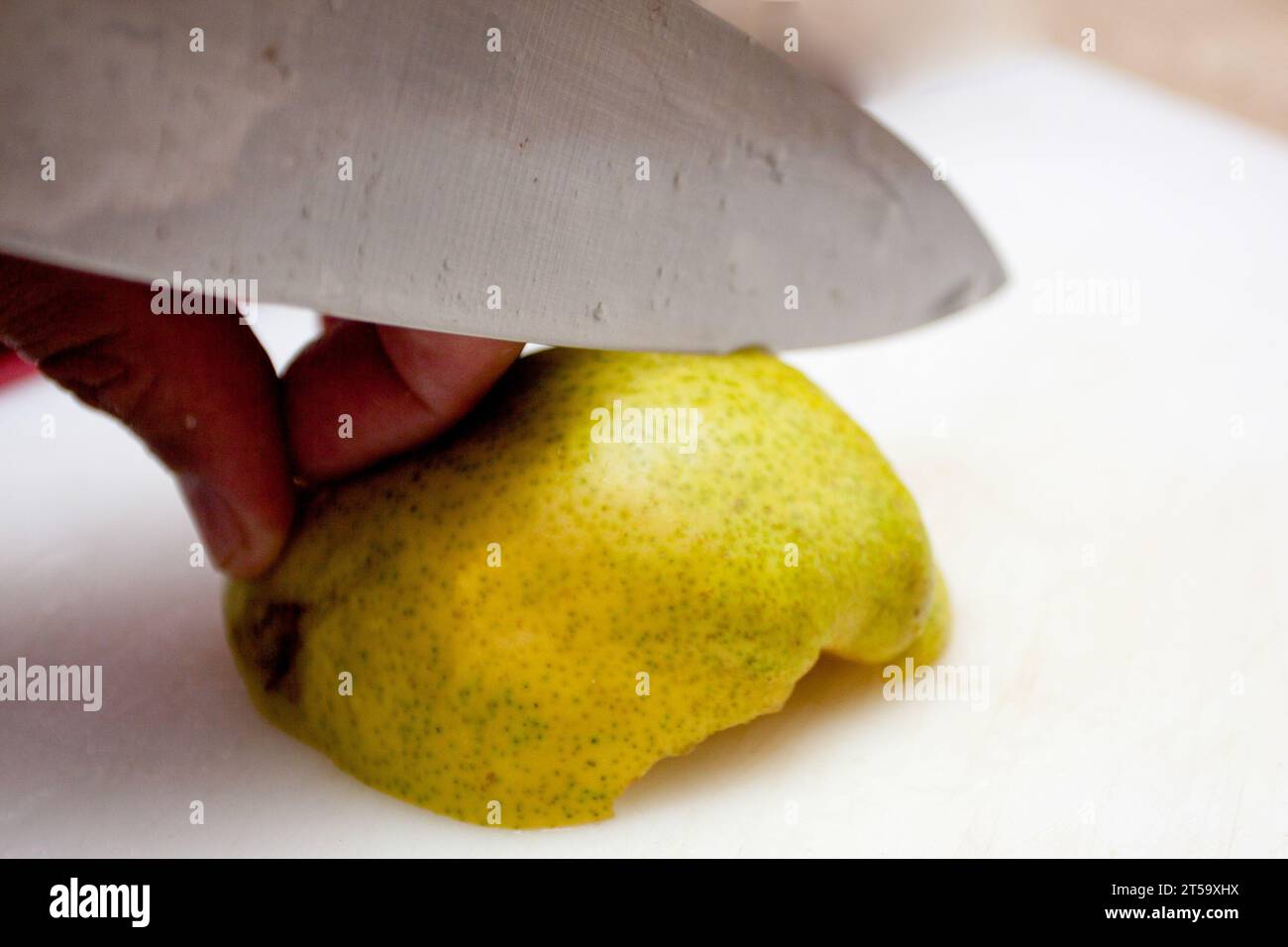 Slicing a pear hi-res stock photography and images - Alamy