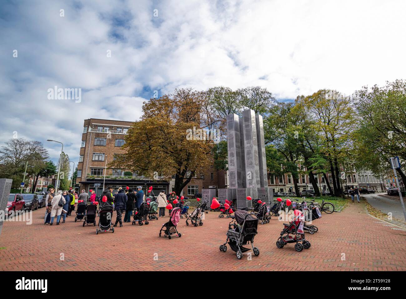 Israeli and non-Israelis with red-helium balloons attached to prams and ...