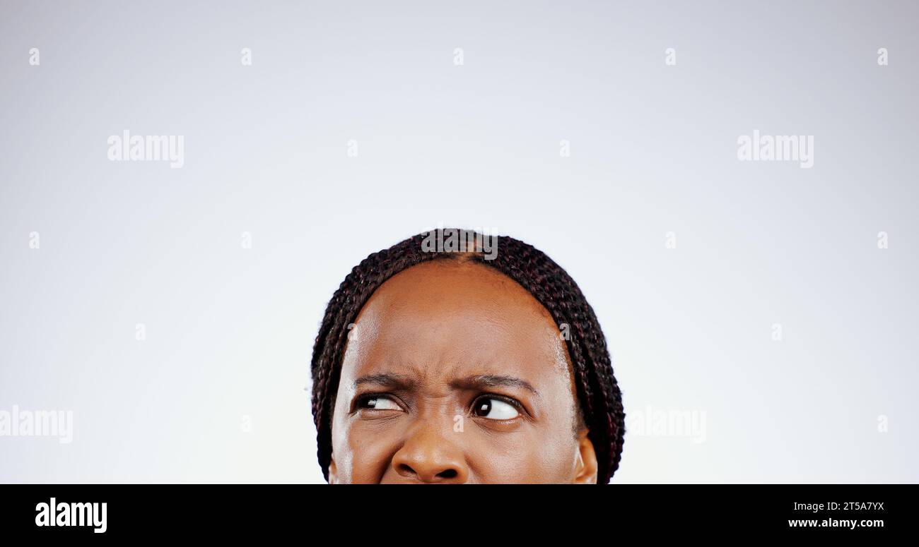 Confused, face and eyes of black woman thinking with doubt, questions ...