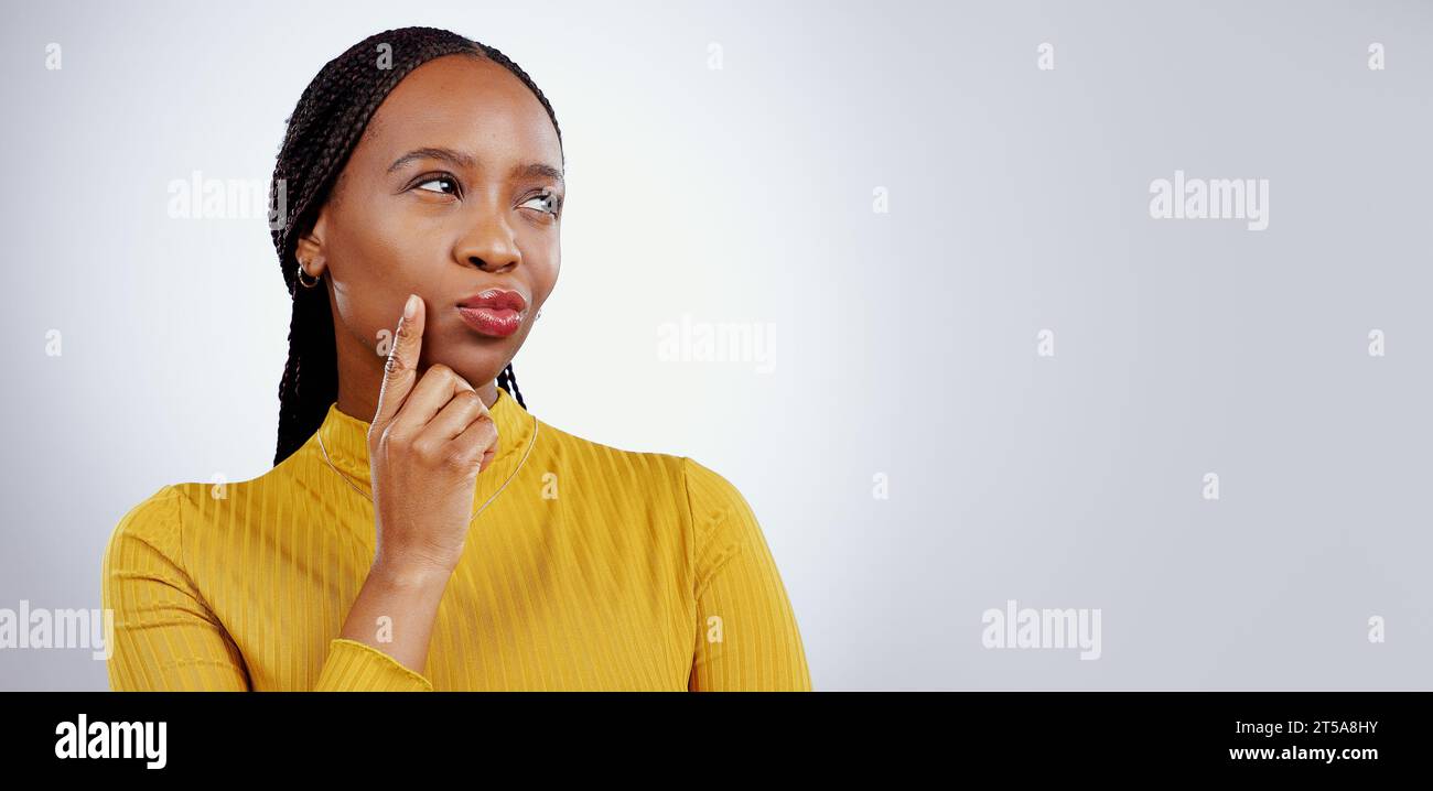 Woman, face and thinking in studio of ideas, mindfulness and solution ...