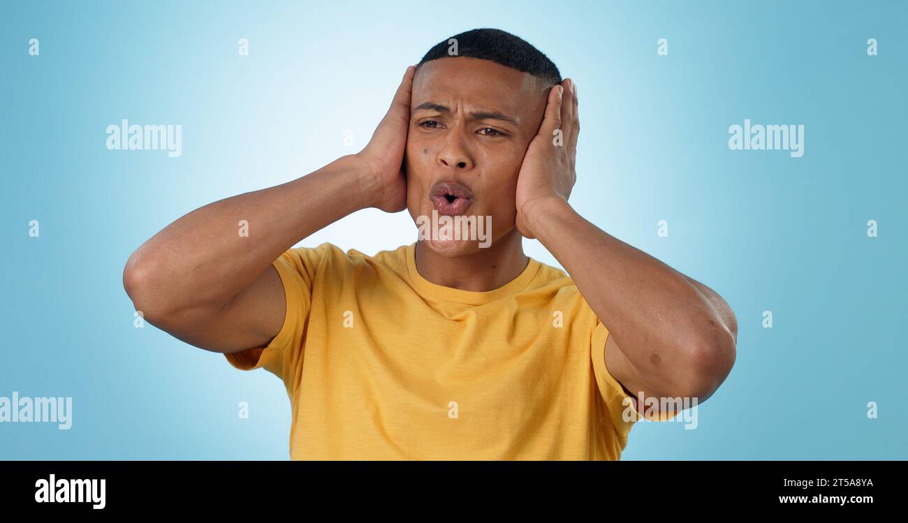 Fail, mistake and hands on face of man in studio with disaster, news or ...